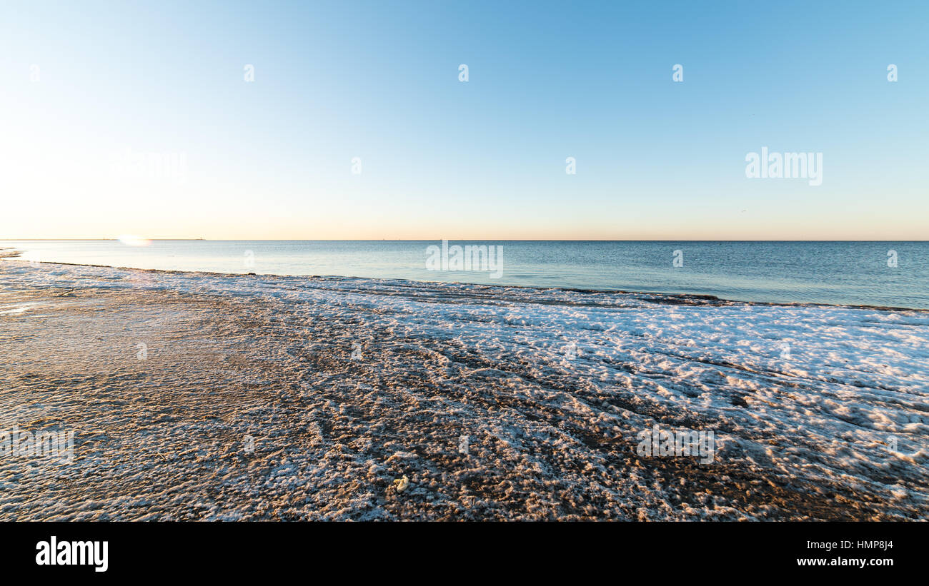 sunset over frozen sea with ice blocks and dramatic colorful sky Stock ...