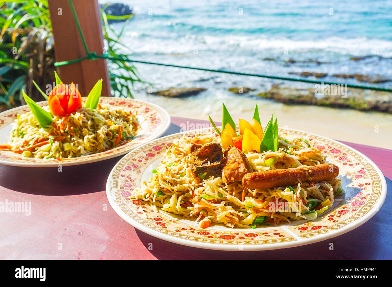 The noodles with meat and vegetables at the coastal outdoor cafe of ...