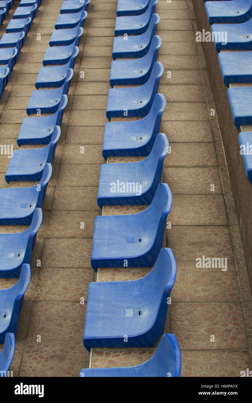 Blue seats on stadium Stock Photo - Alamy