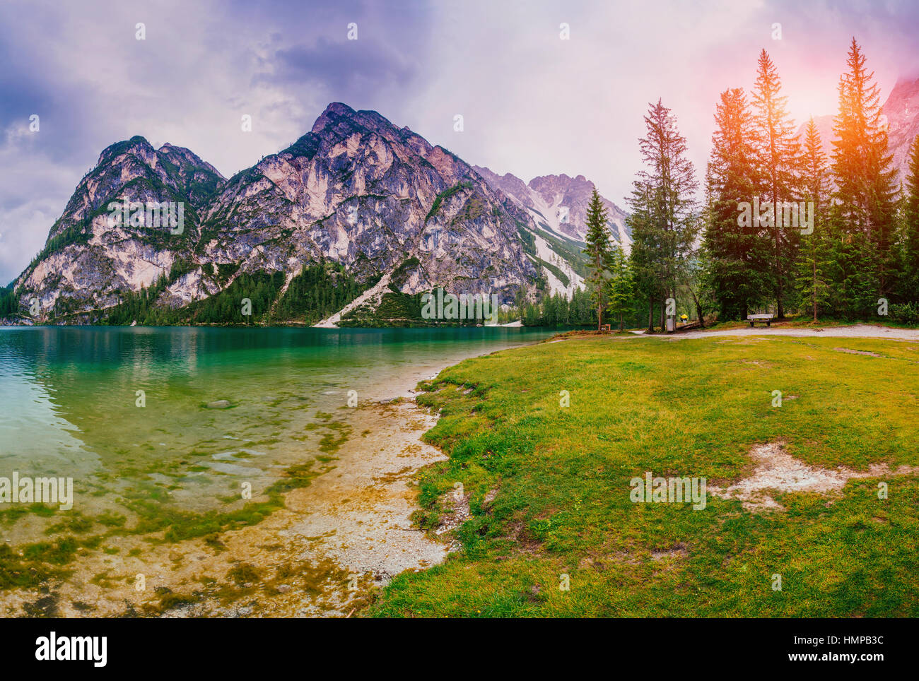 Mountain lake between by mountains Stock Photo - Alamy