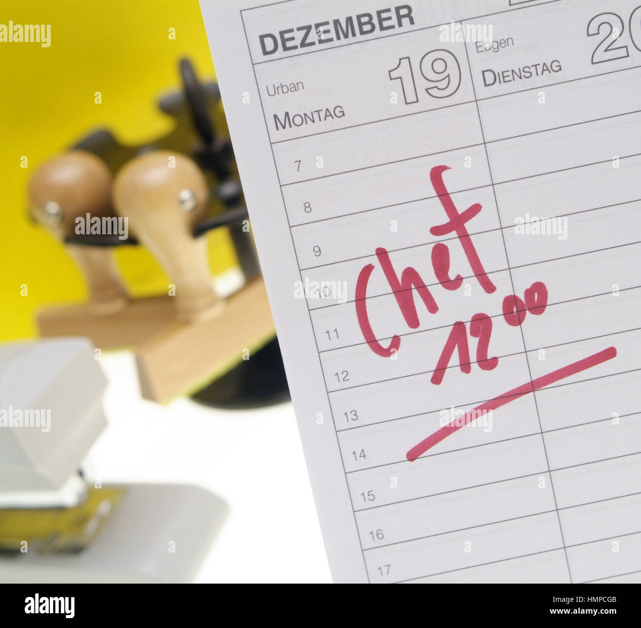 Notice on calendar, meeting with the boss Stock Photo - Alamy