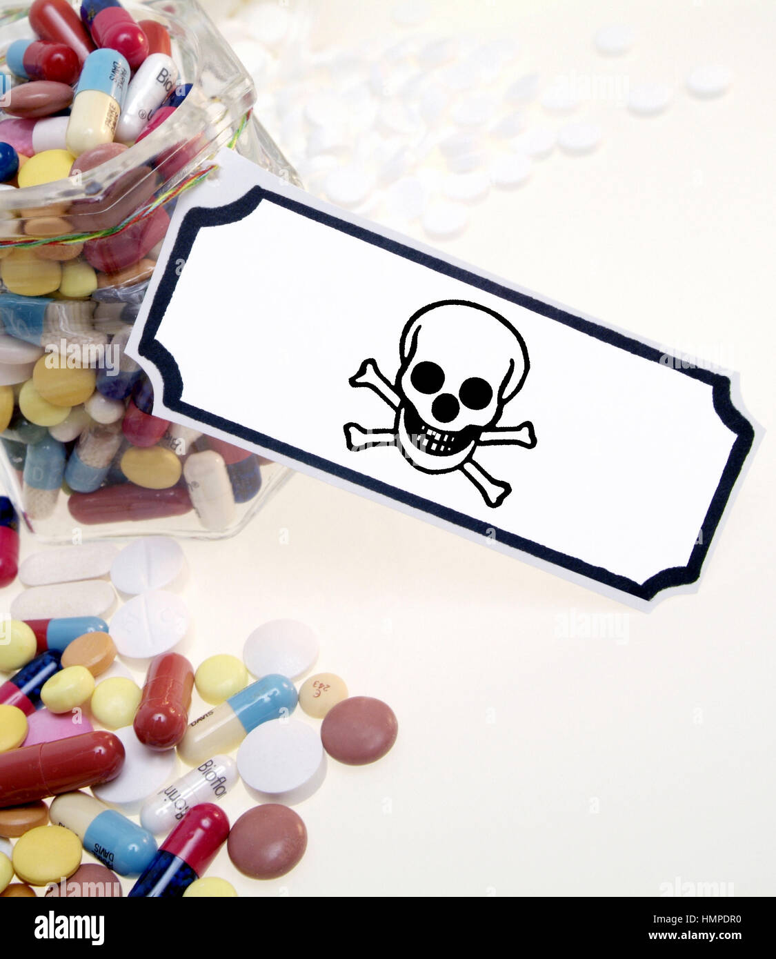 Symbolic for dangerous pills Stock Photo - Alamy