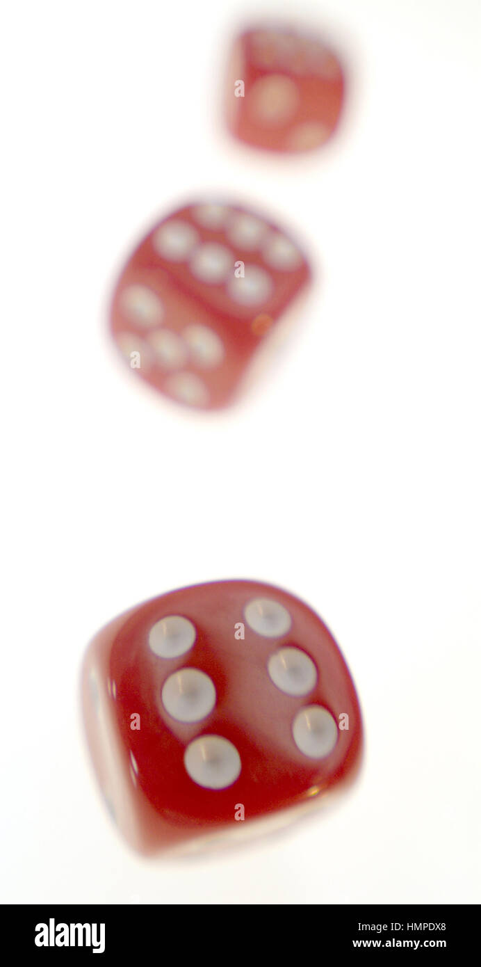 Three red dice Stock Photo - Alamy