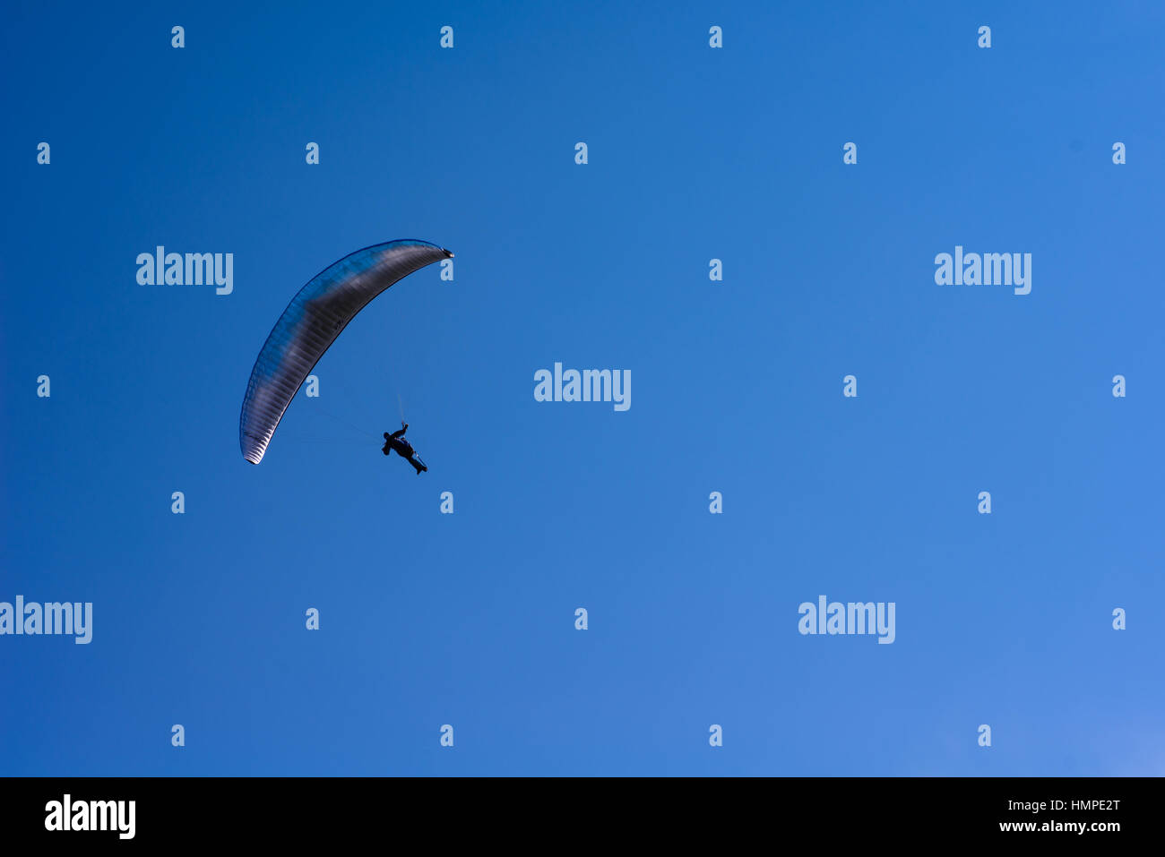 Parachutist flying high in sky hi-res stock photography and images - Alamy