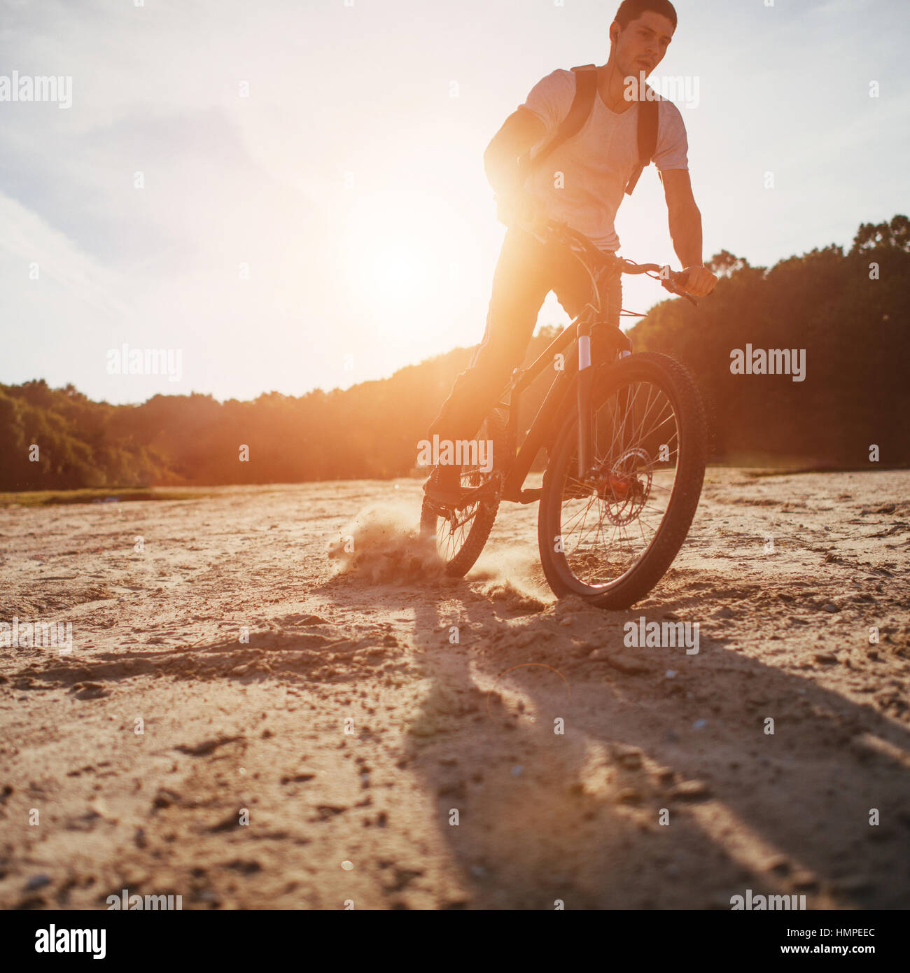Professional mountain biker riding along hi-res stock photography and ...