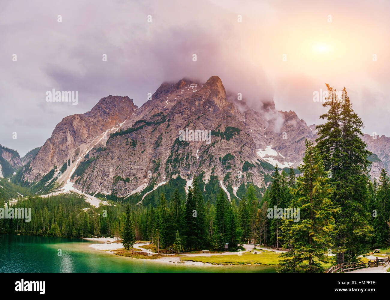Mountain lake between by mountains Stock Photo - Alamy