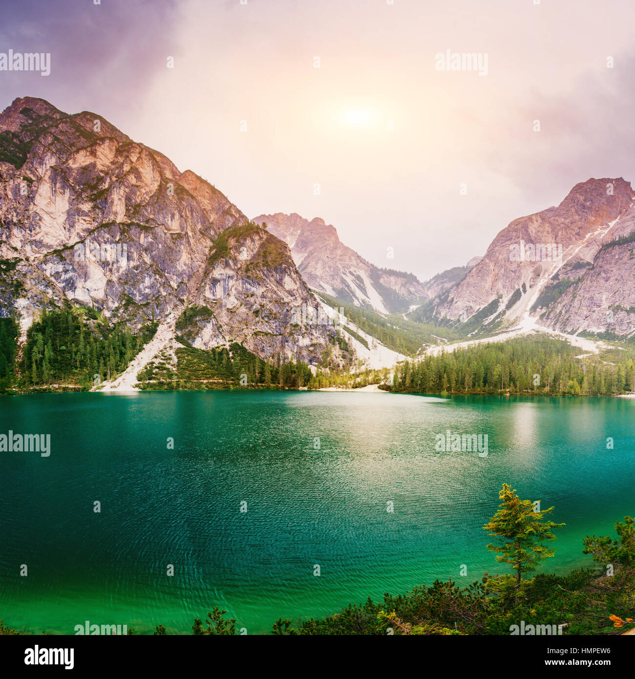 Mountain lake between by mountains Stock Photo - Alamy