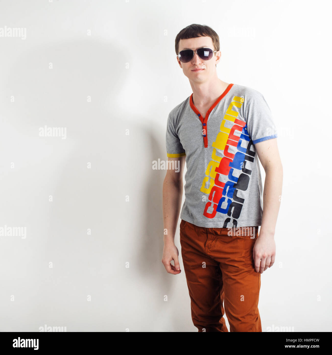 handsome man standing isolated Stock Photo - Alamy