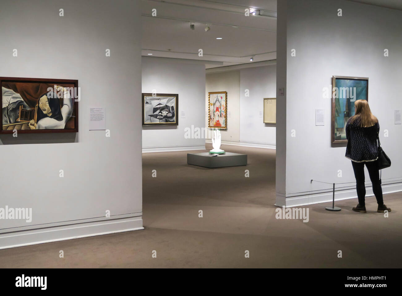Female visitor inside art museum hi-res stock photography and images ...