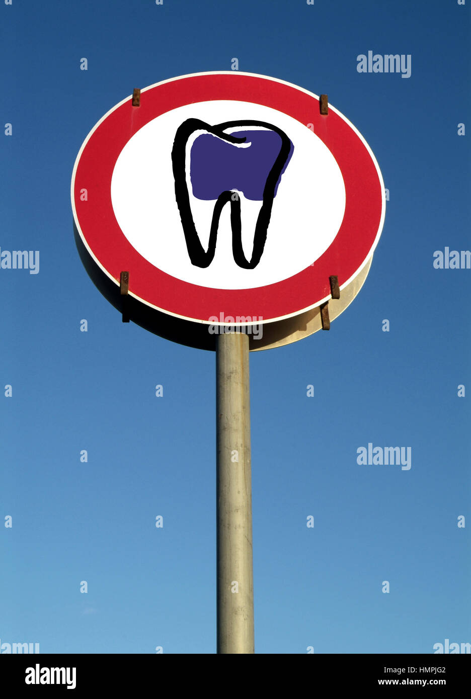 Symbolic traffic sign tooth Stock Photo - Alamy