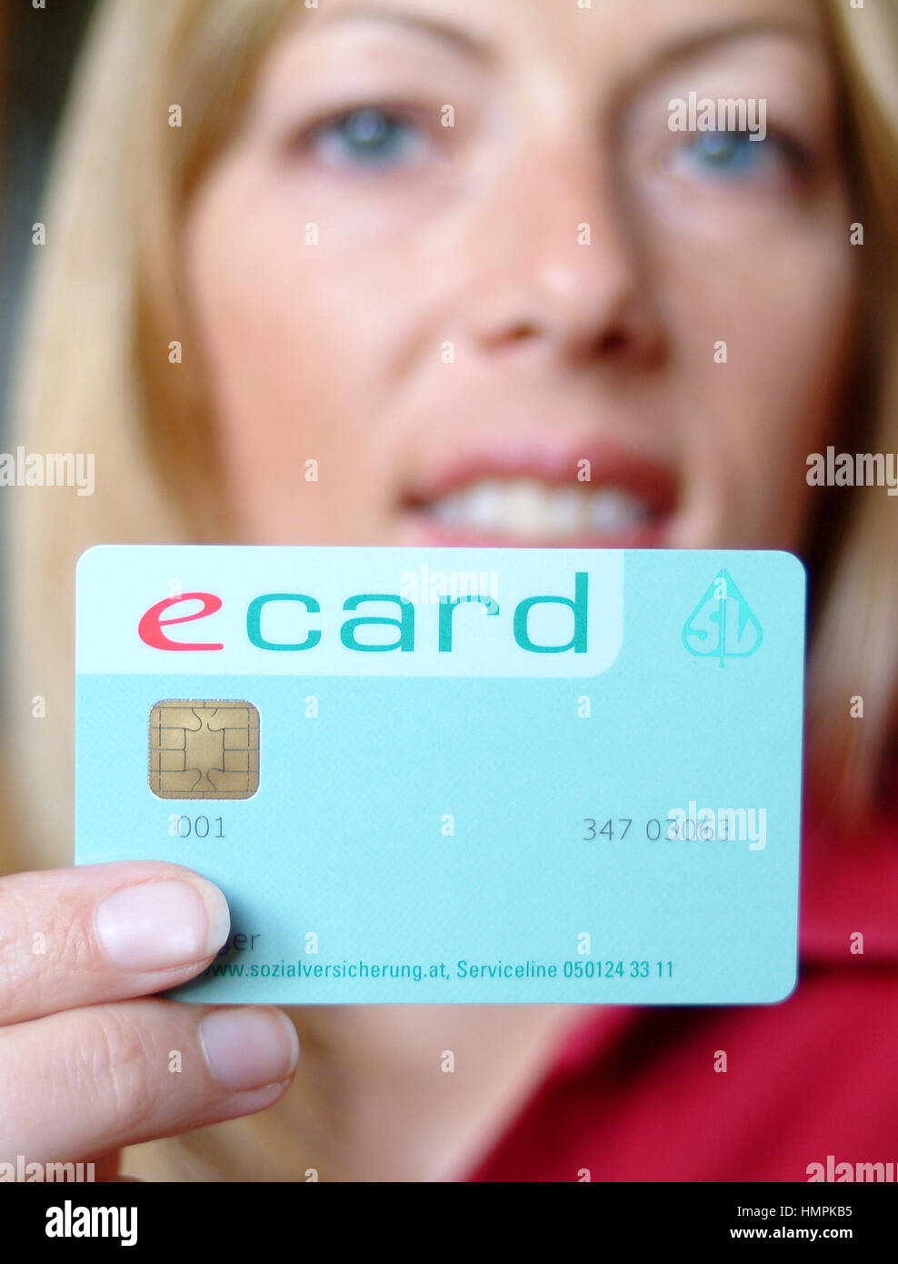 Woman with e card Stock Photo - Alamy