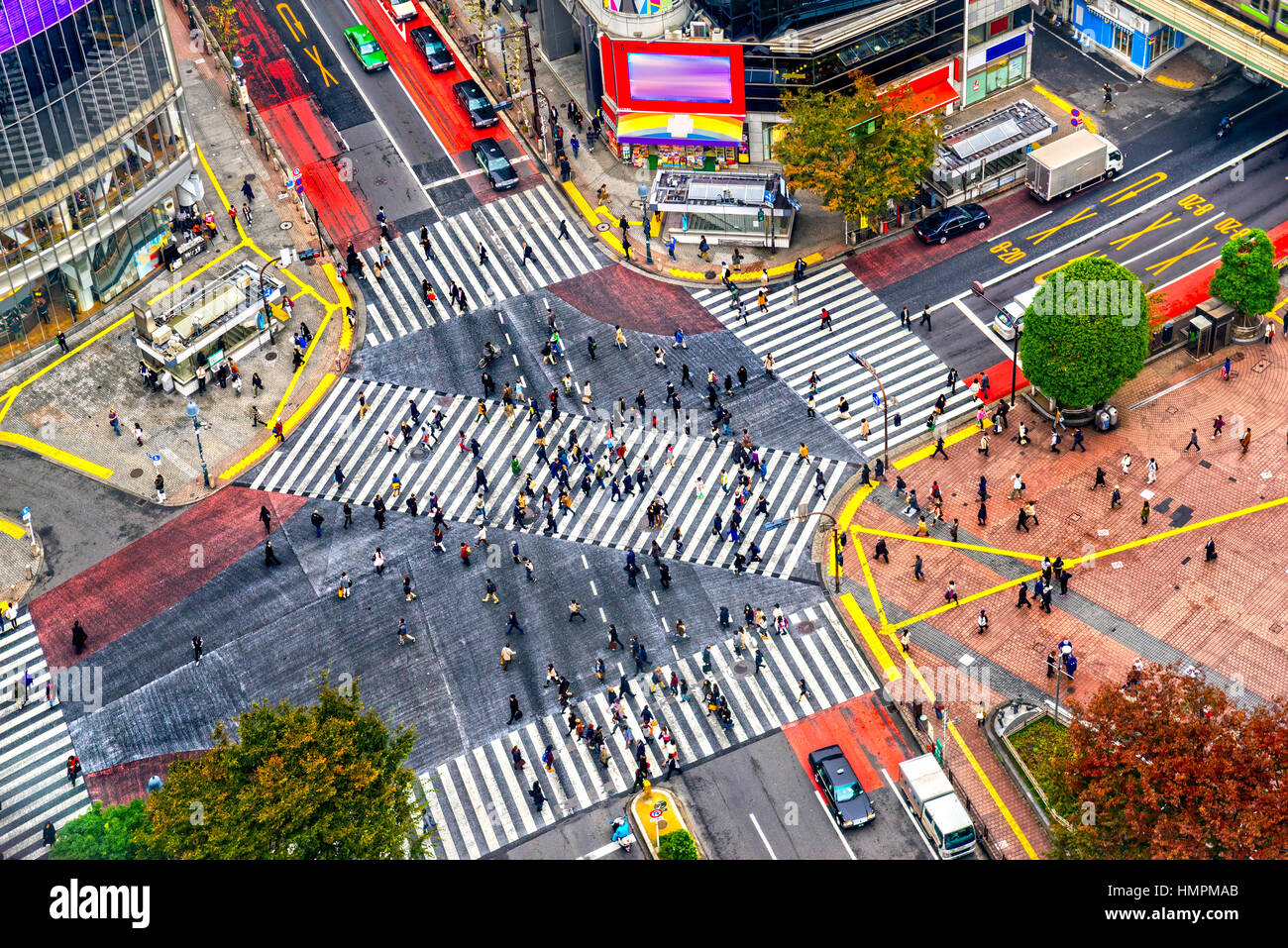 Shibuya District and Shibuya Crossing, Tokyo. The scramble crosswalk is ...