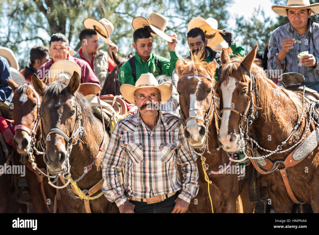 Mexican cowboys during Catholic mass marking Three Kings Day and the ...