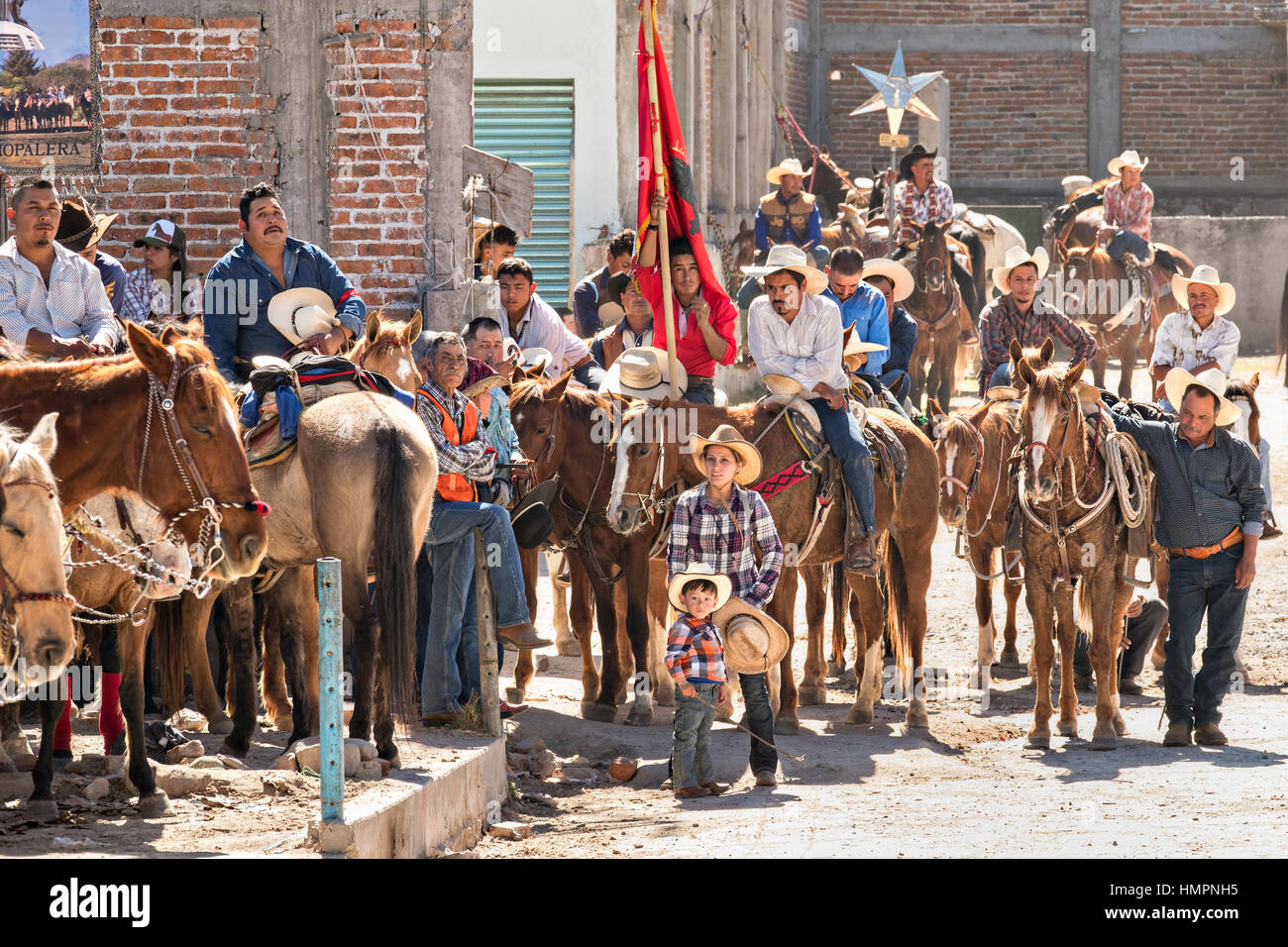 Mexican cowboys pray during Catholic mass at the San Martin de Terreros ...