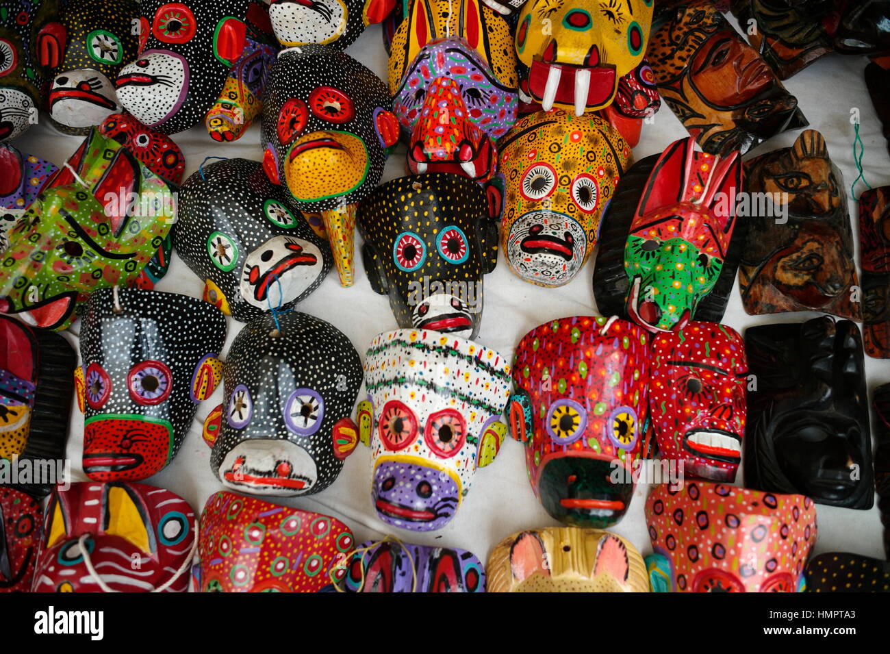 Indigenous masks on sale at The local market at Chichicastenango. This ...