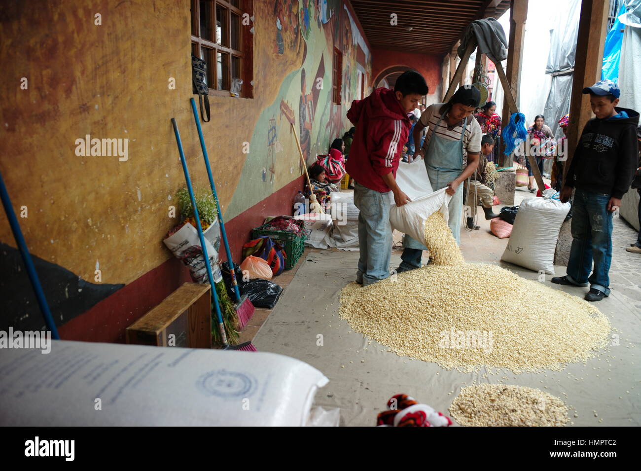 Indigenous people buying and selling grains Stock Photo - Alamy