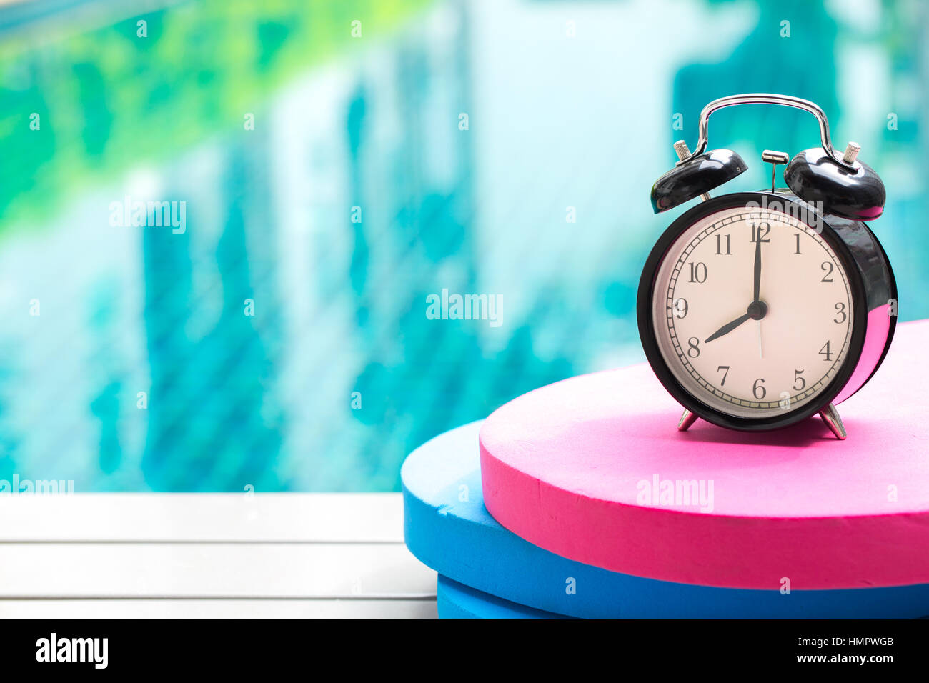 swimming times, retro black bell clock time at 8 o'clock at swimming ...