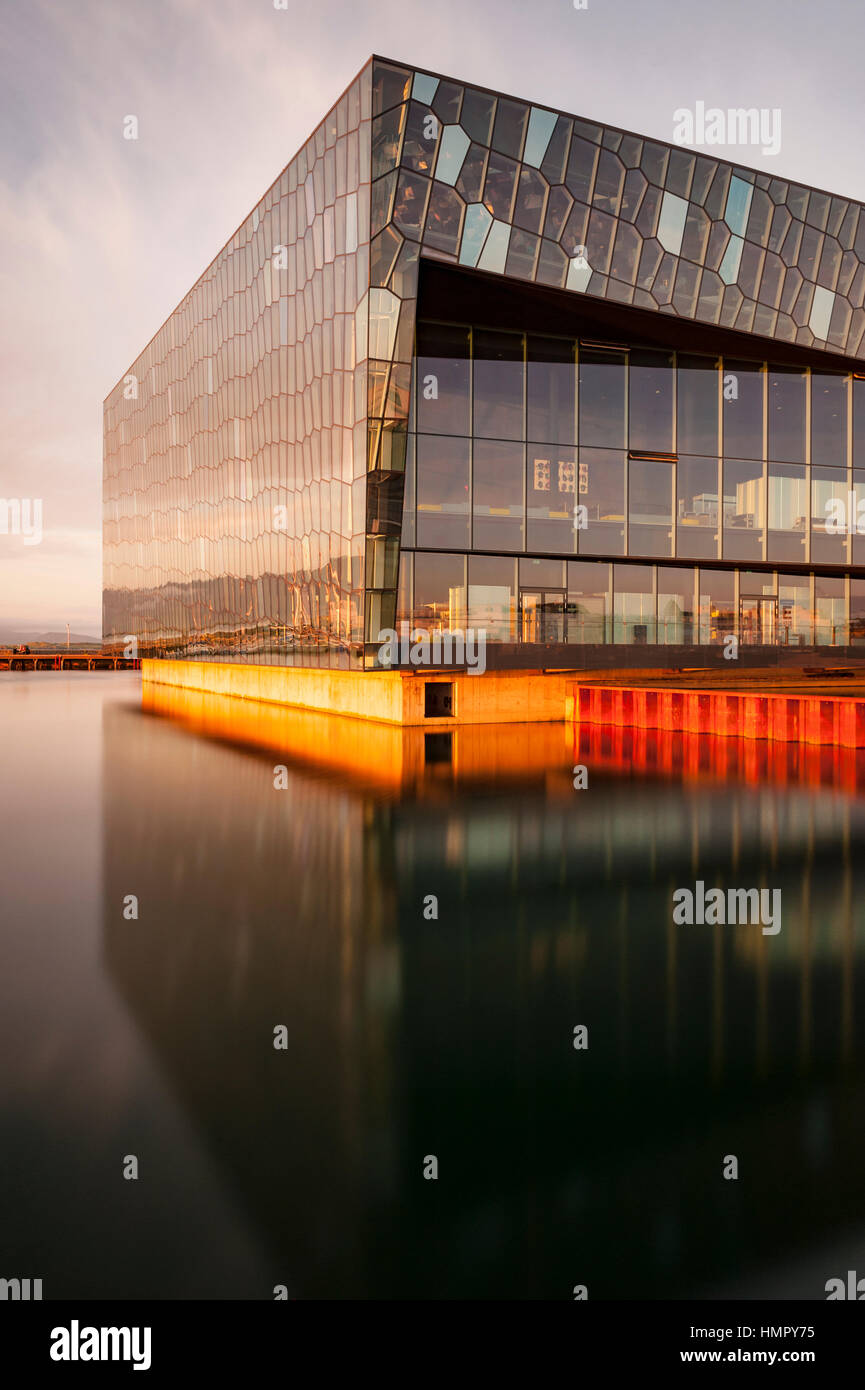 Midnight sun reflected on Harpa Concert Hall and Conference Centre ...