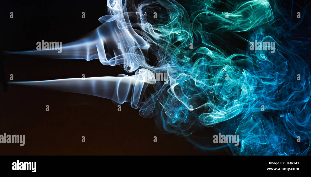 long smoke colorful blue curves isolated Stock Photo - Alamy
