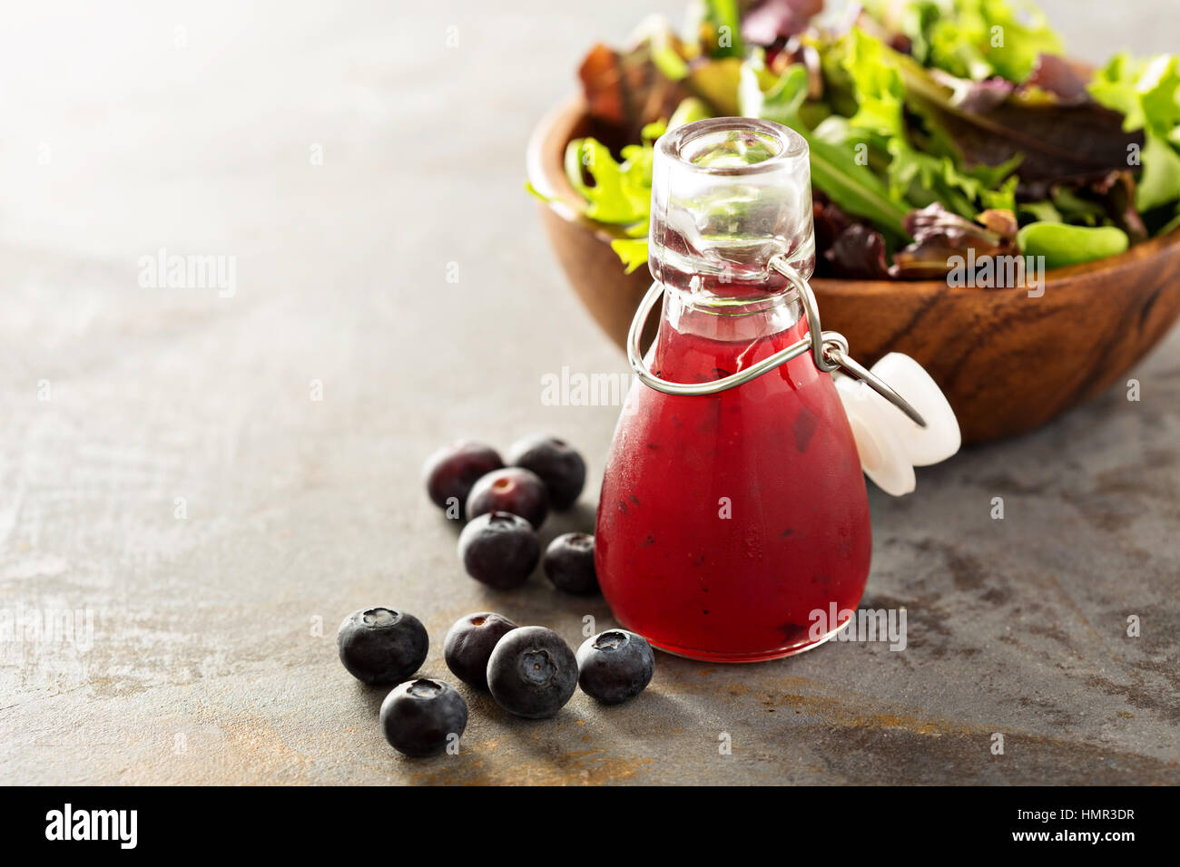 Blueberry vinaigrette salad dressing in small bottle Stock Photo - Alamy