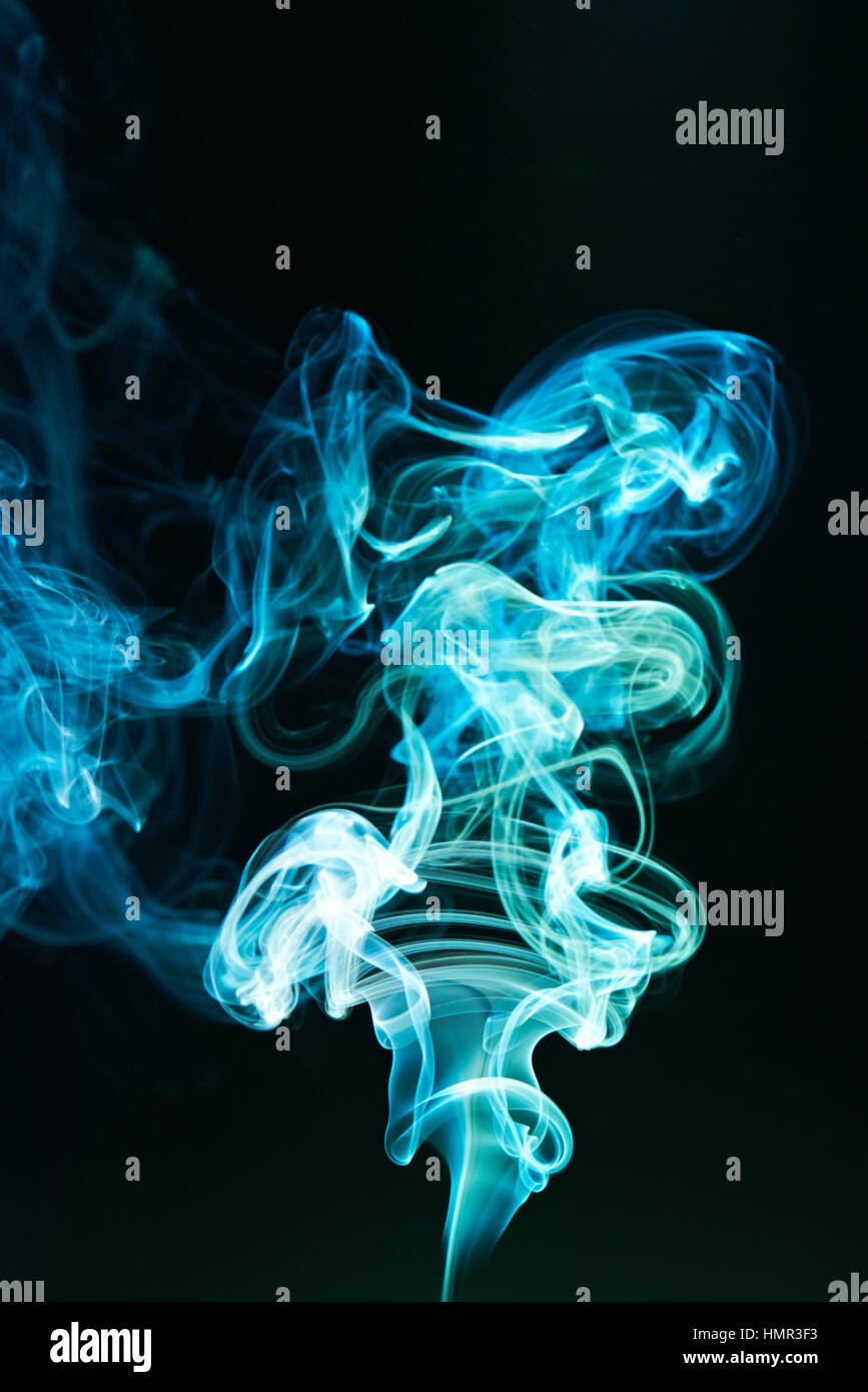 macro cloud of green smoke on black background Stock Photo - Alamy