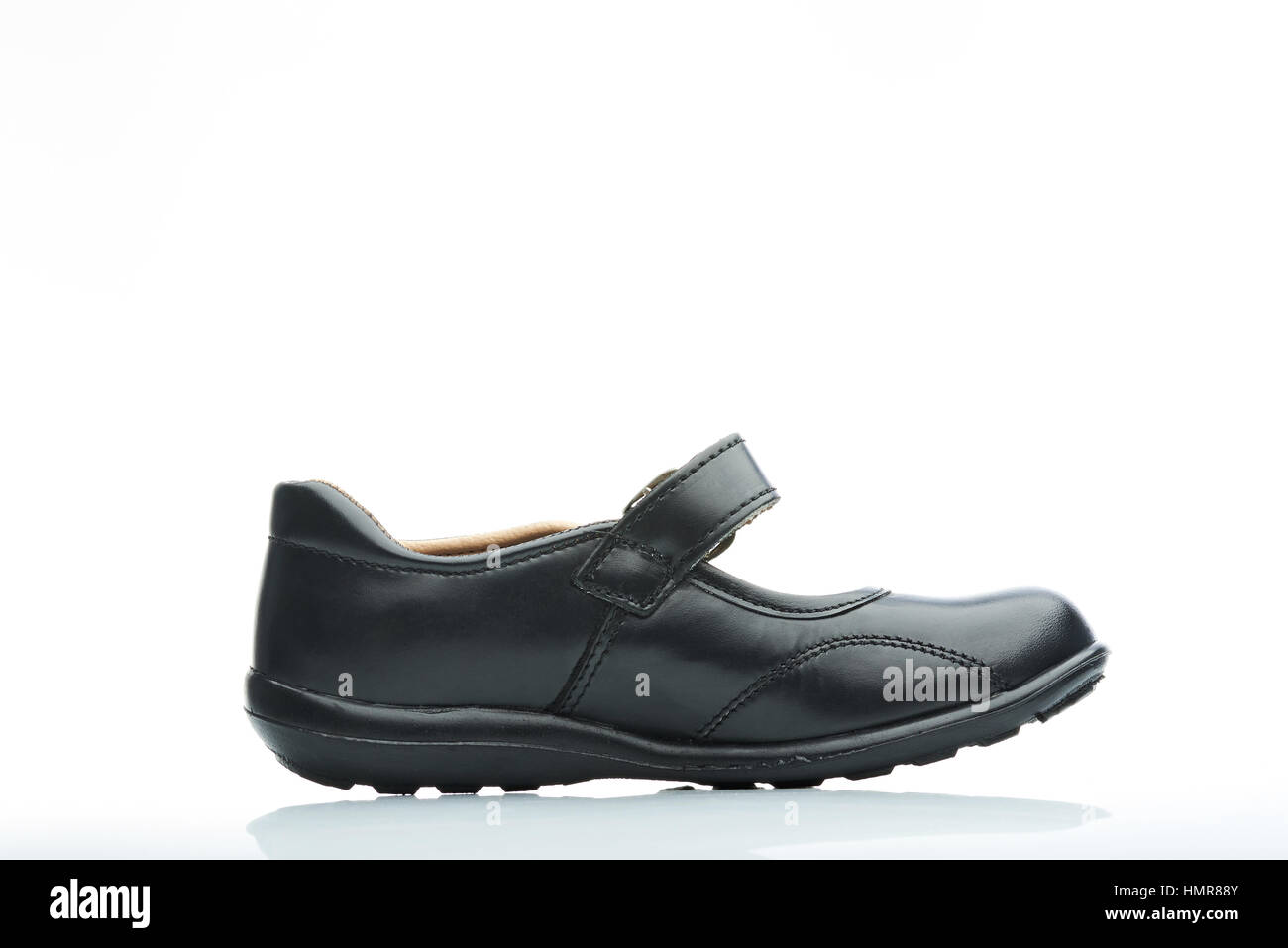 side view school girl leather shoe catalog style Stock Photo - Alamy