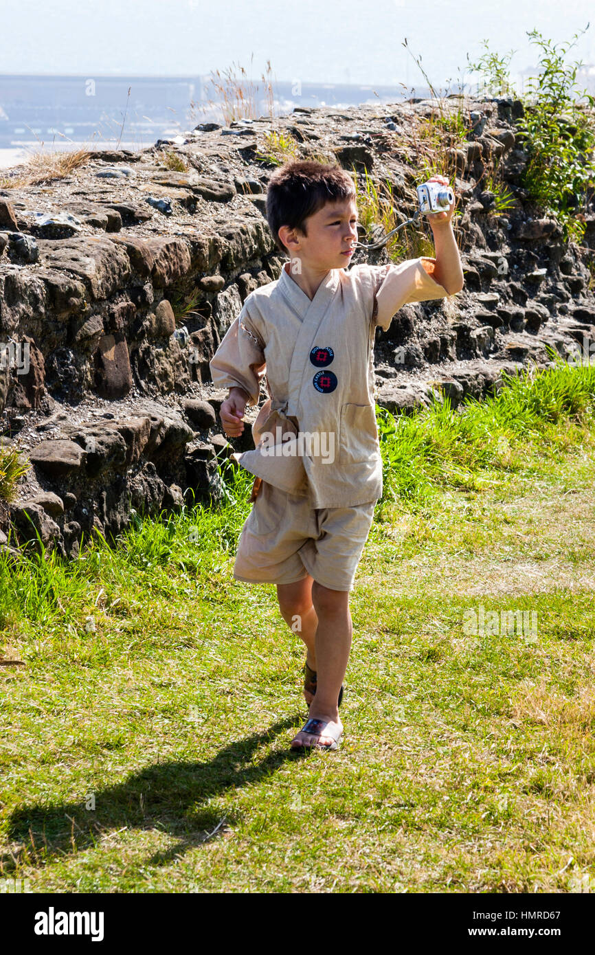 England, Dove castle. Caucasian child, boy, 6-7 years, walking along ...