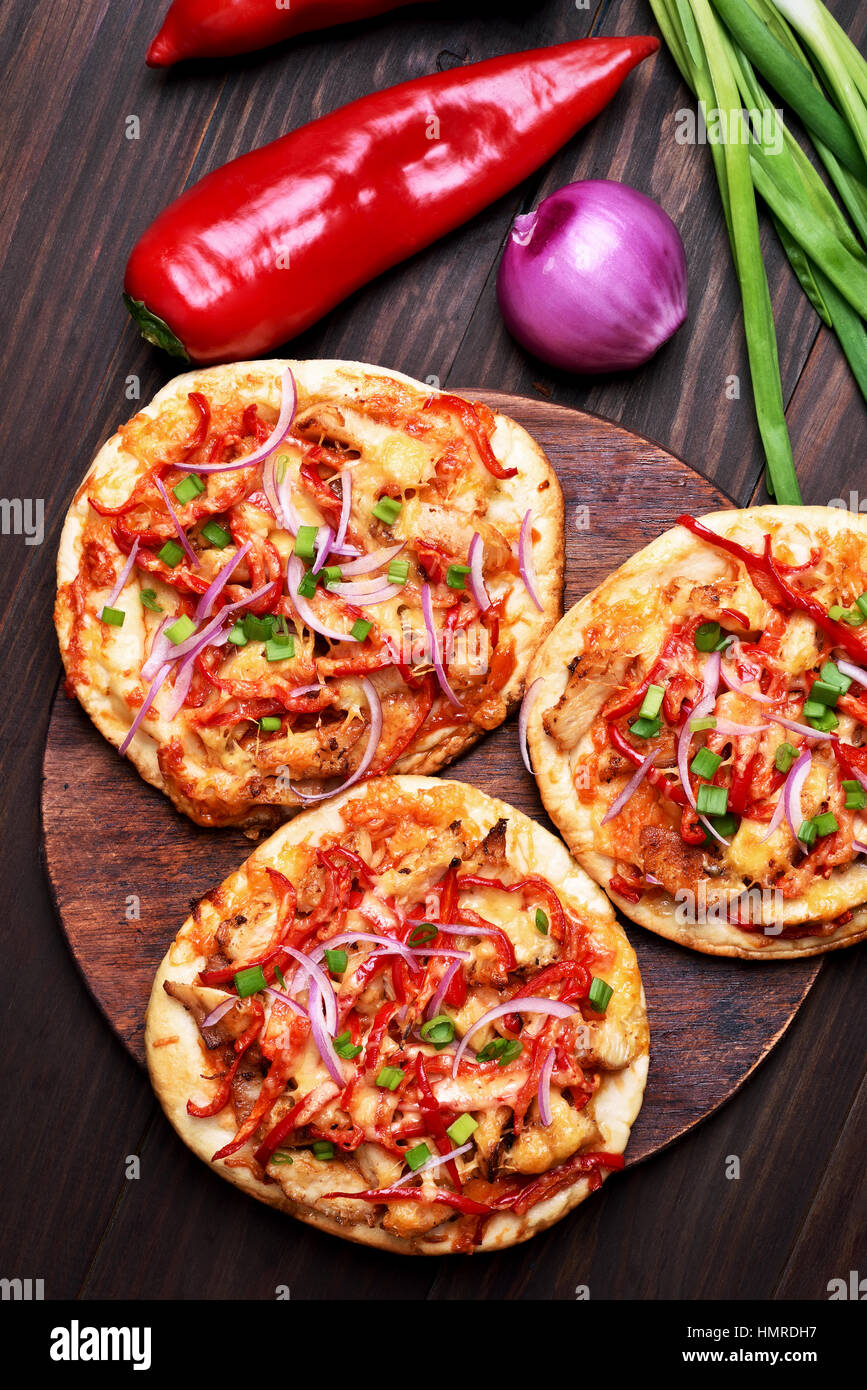 Pizza with chicken meat and vegetables, top view Stock Photo - Alamy