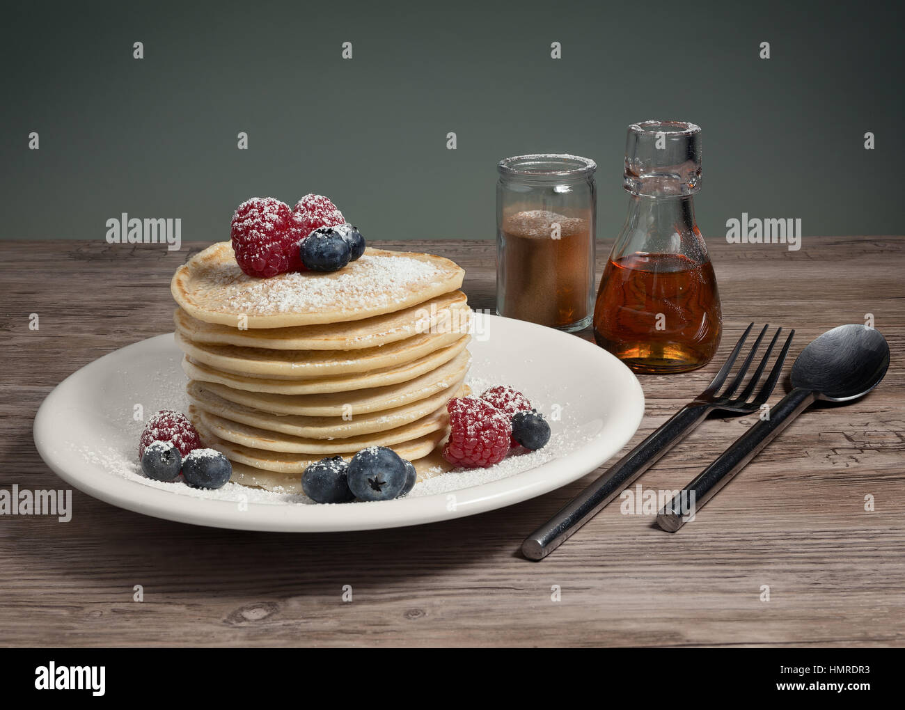 A stack of pancakes served with fruit Stock Photo - Alamy