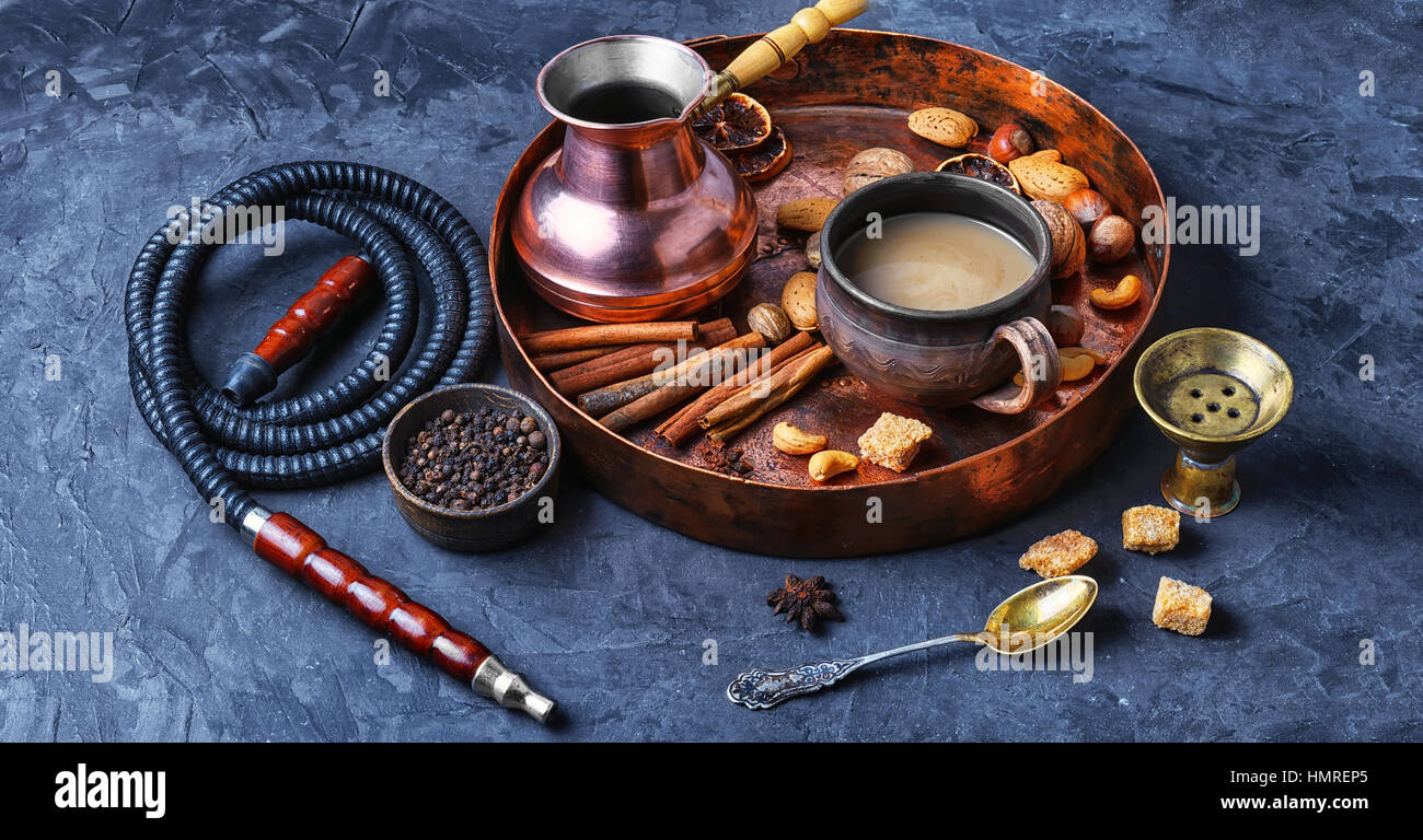 aroma Arab hookah with coffee in vintage style Stock Photo - Alamy