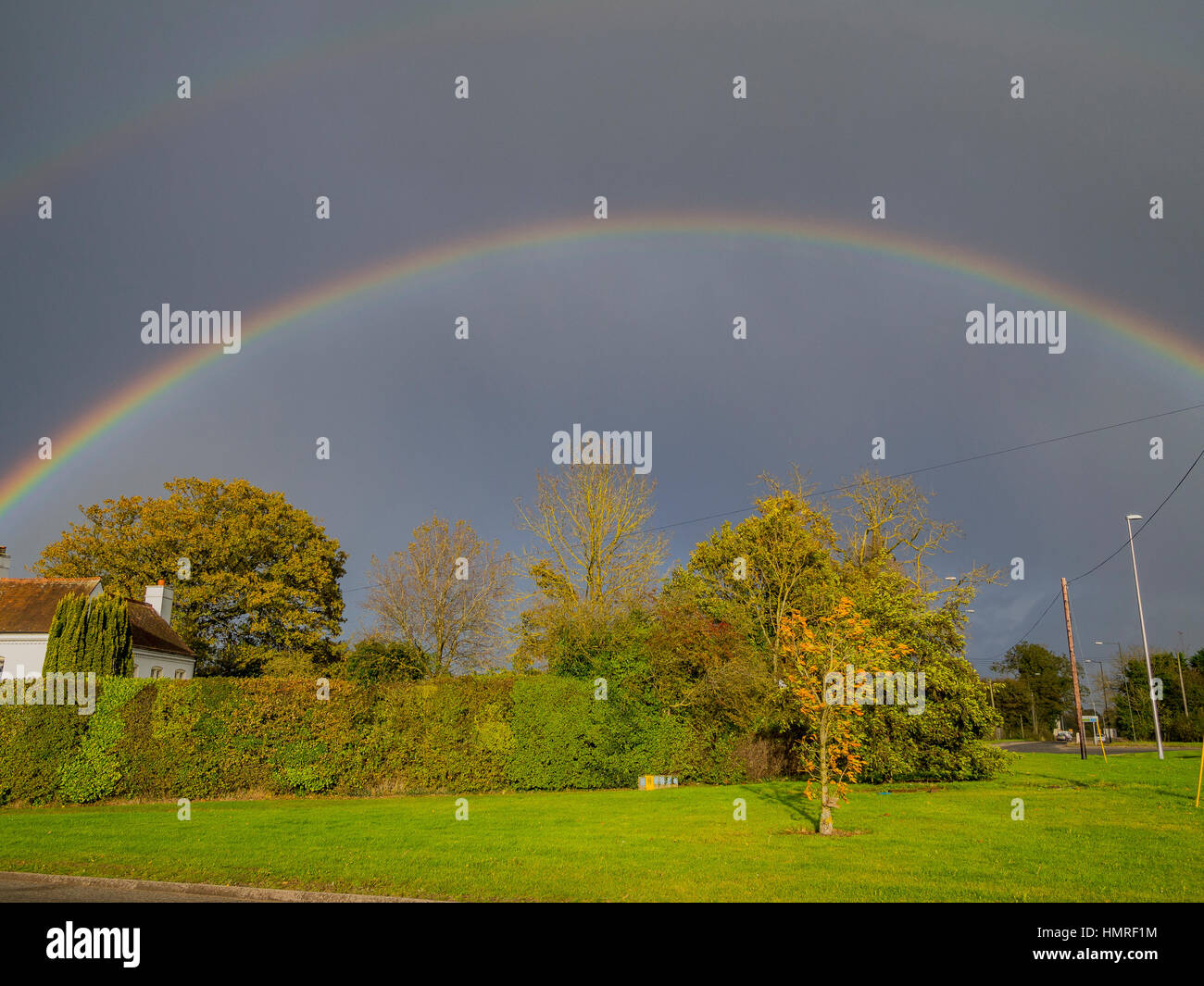 english rural cottage rainbow Stock Photo - Alamy