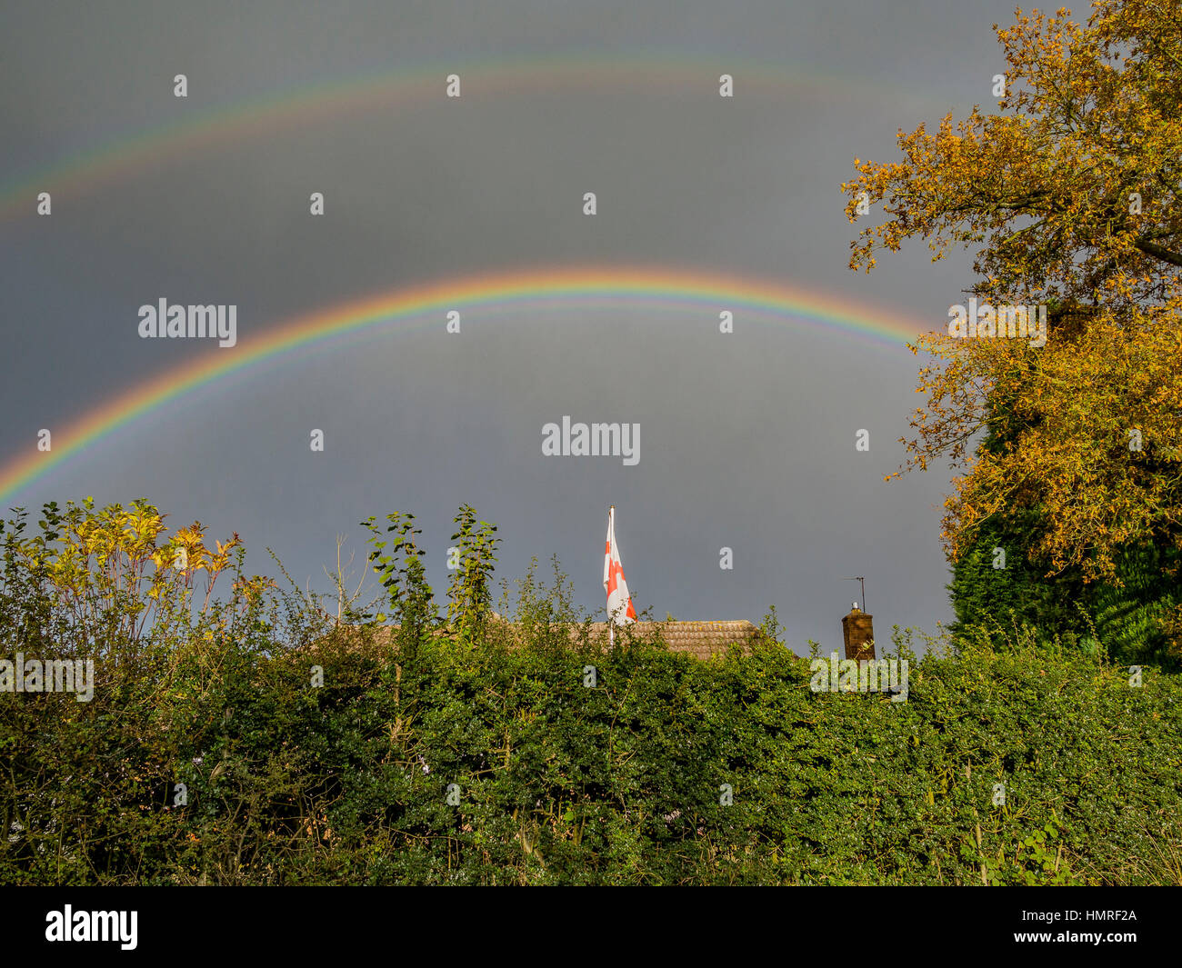 english rural cottage rainbow Stock Photo - Alamy