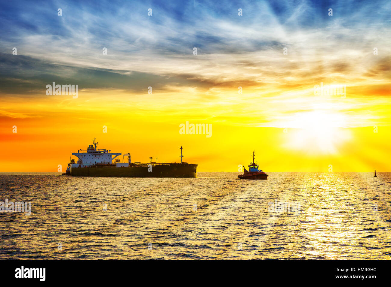 Sun setting sea tanker hi-res stock photography and images - Alamy