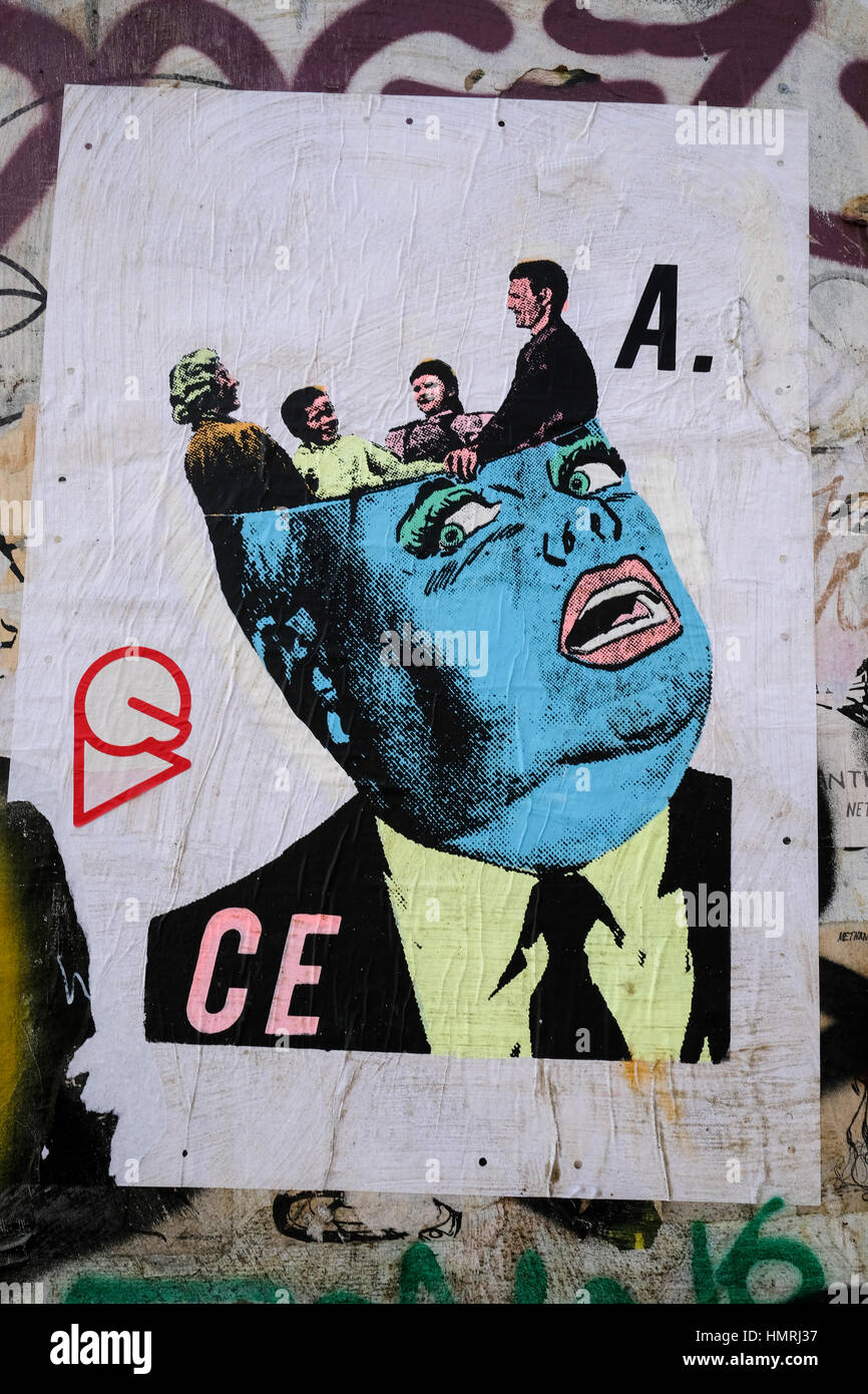 Pop art open head poster attached to the wall in Brick Lane, London, UK ...