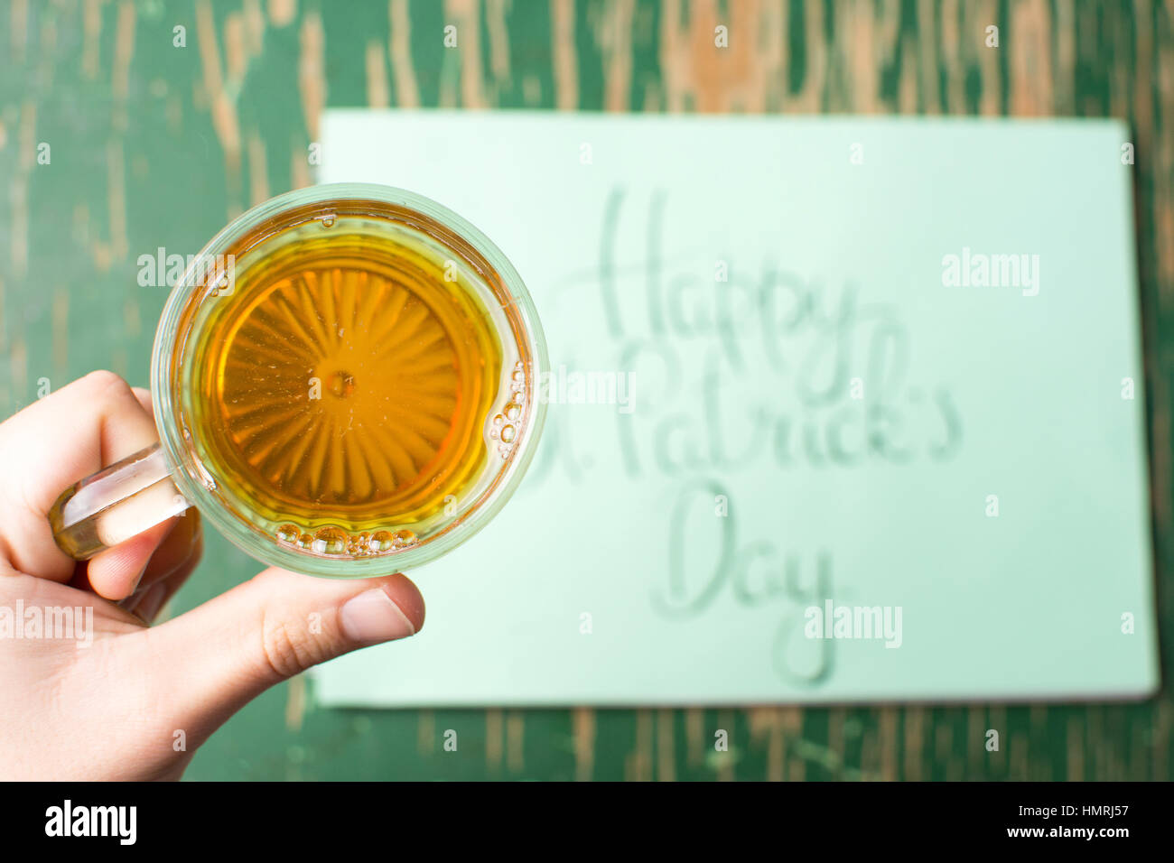 Man having a beer with Happy St Patrick day calligraphy card Stock ...
