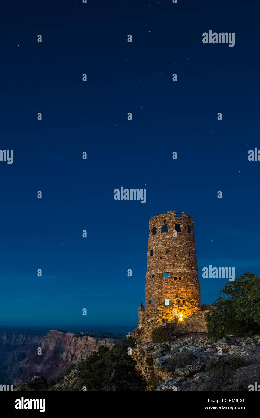 Desert View Watchtower at deep twilight with stars emerging from the ...