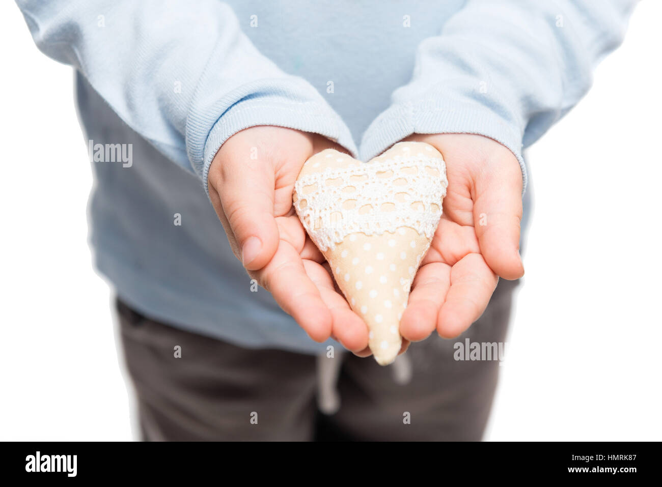 Heart in hands of little kid. Isolated on a white background Stock ...