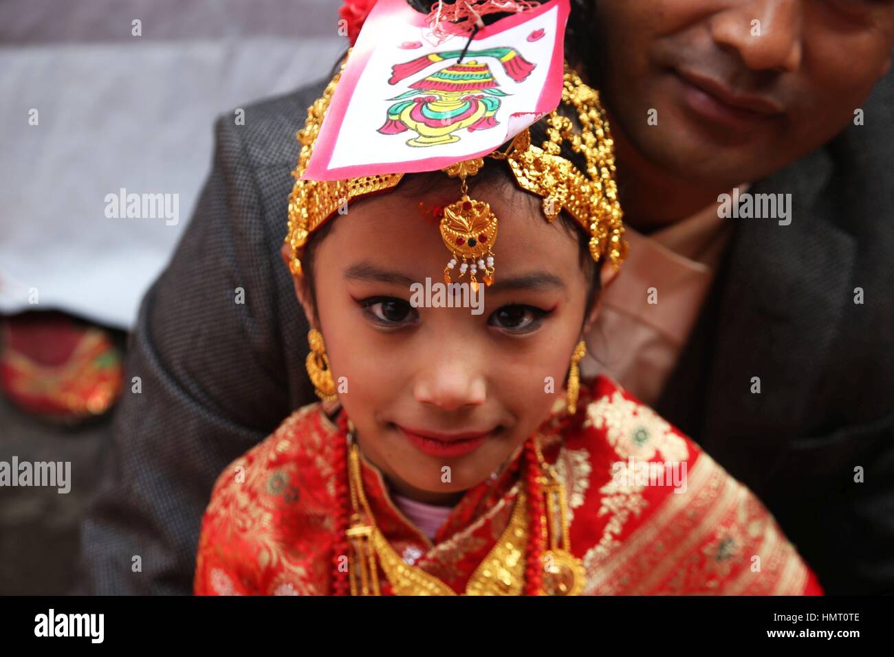 Kathmandu, Nepal. 5th Feb, 2017. A girl from Newar community attends a ...