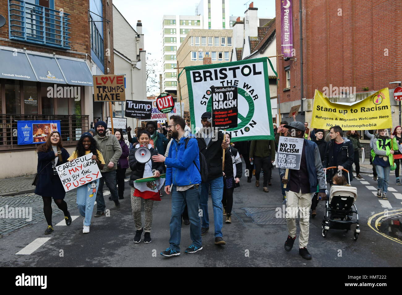 Bristol, UK. 4h Feb, 2017: Protesters march through the city centre ...