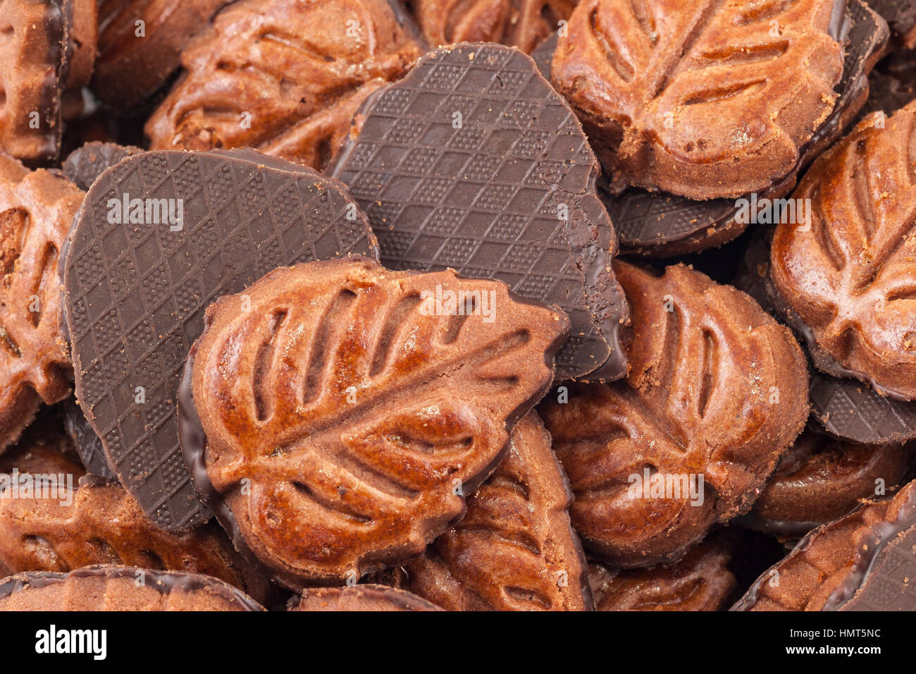 Cookie with chocolate in the shape of a leaf Stock Photo - Alamy