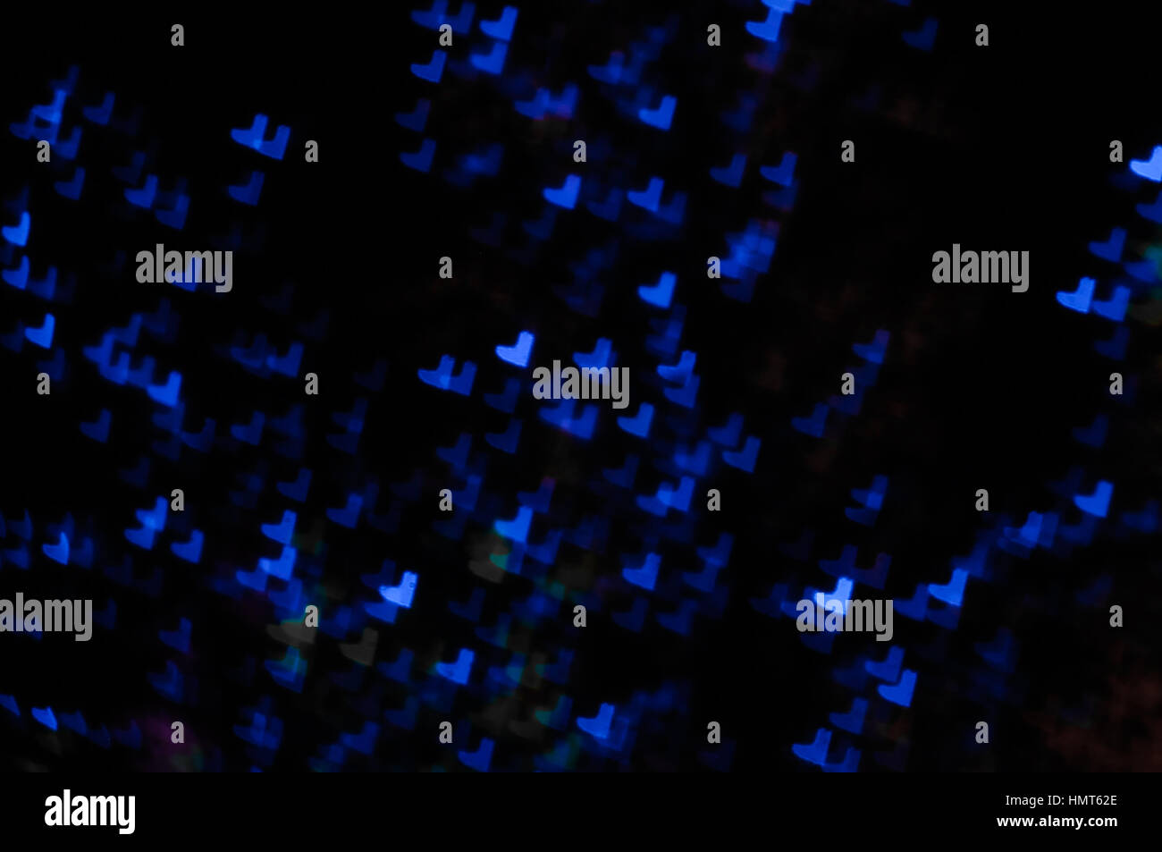 Blue lights of heart shape with dark background Stock Photo - Alamy