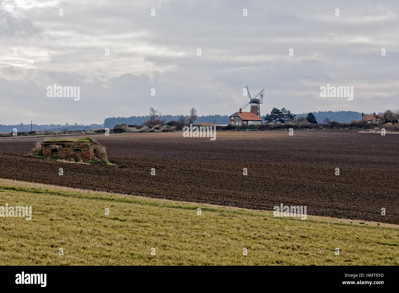 Weybourne Windmill & Old WW2 Defence Look Out Post Stock Photo - Alamy
