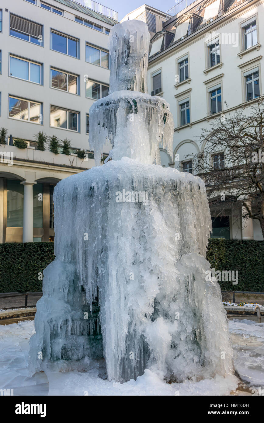 Frozen fountain covered in ice Stock Photo - Alamy