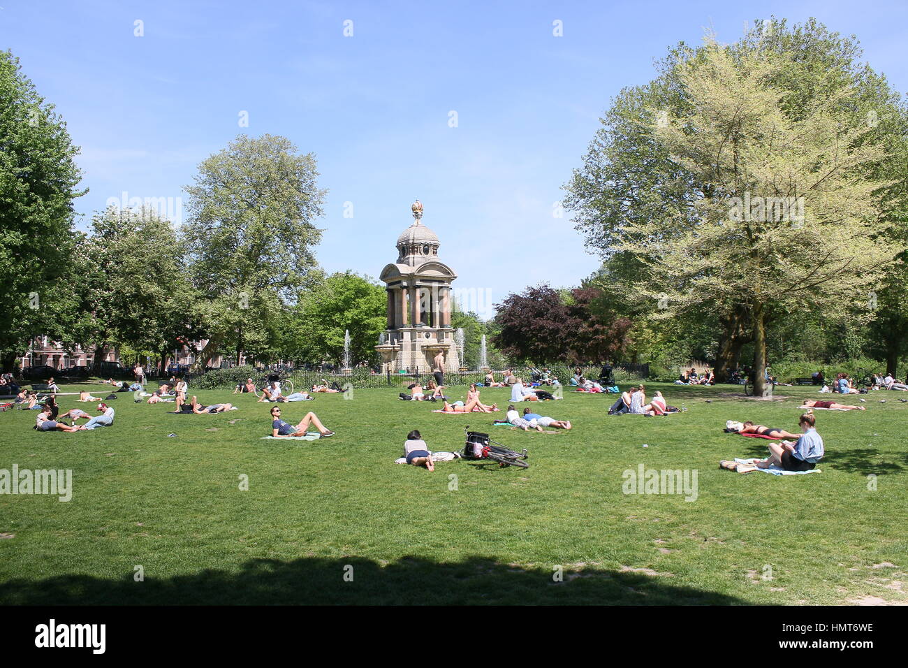 Summer recreation in the 19th century Sarphatipark, a public urban park ...