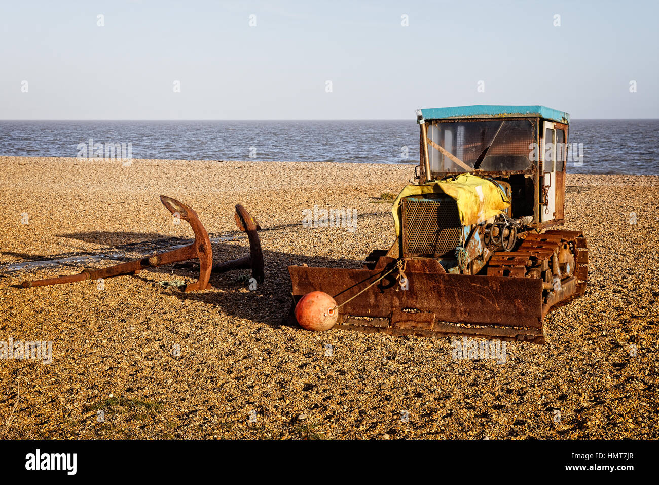 Rusty Tracked Bulldozer on a Shingle Beach Stock Photo - Alamy