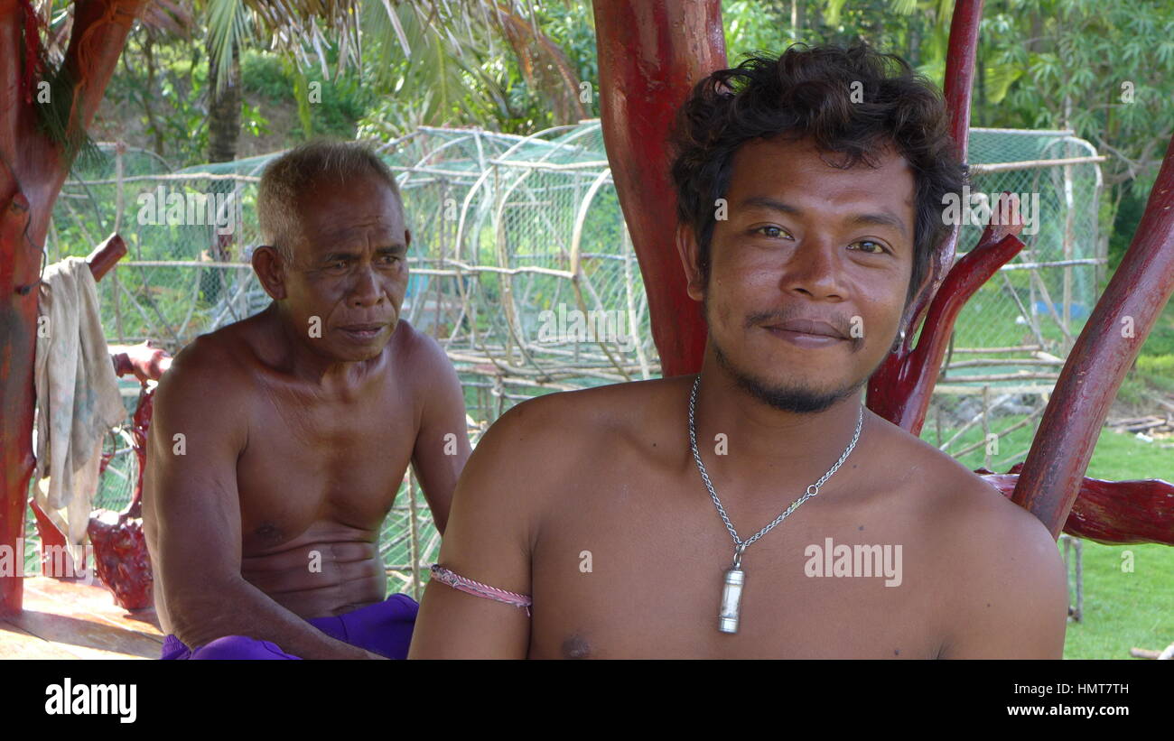 Two fishermen, father and son, Baan Ting Rai village, Koh Jum, Thailand ...