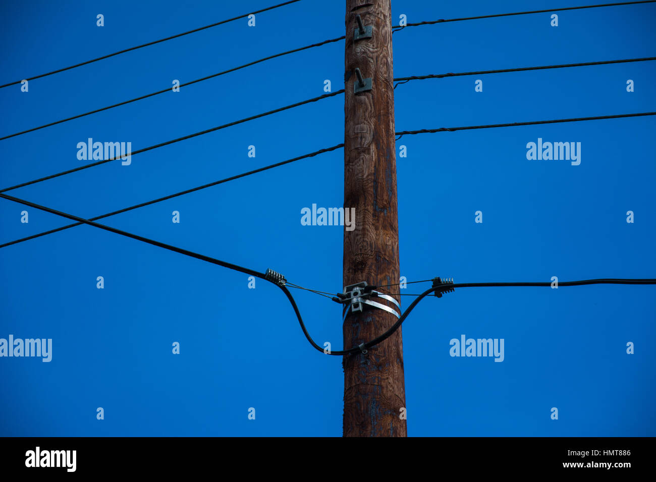 BT Fibre cable sharing pole with electrical power transmission grid ...