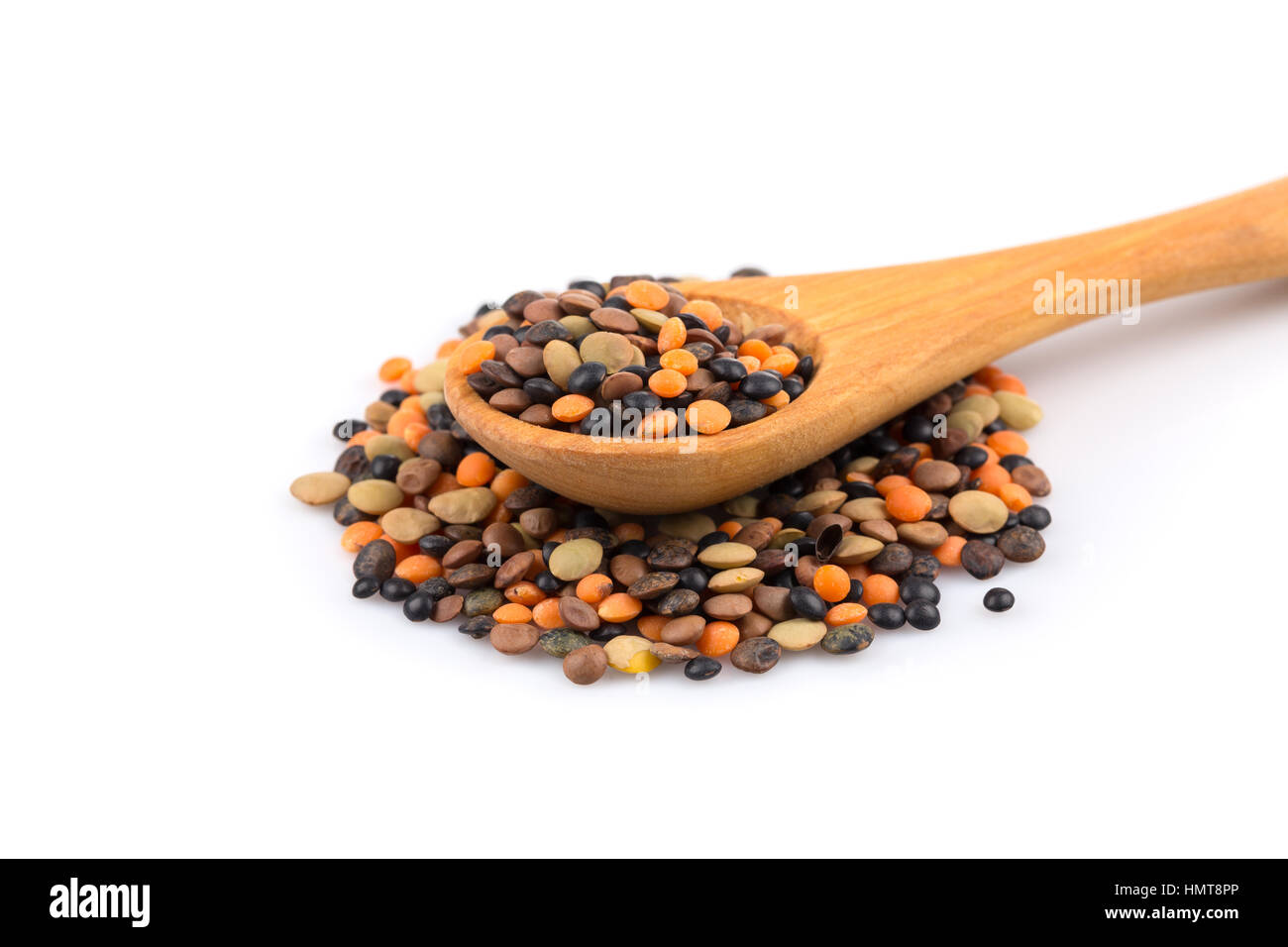 Various lentils mix on a white background in a wooden spoon Stock Photo ...
