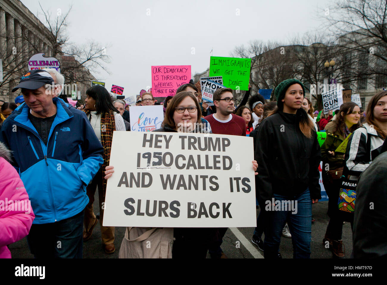 Protesters marching with signs hi-res stock photography and images - Alamy