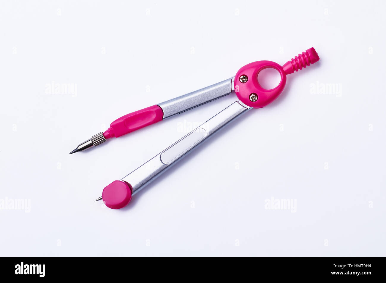 Pink pair of drawing compasses Stock Photo - Alamy